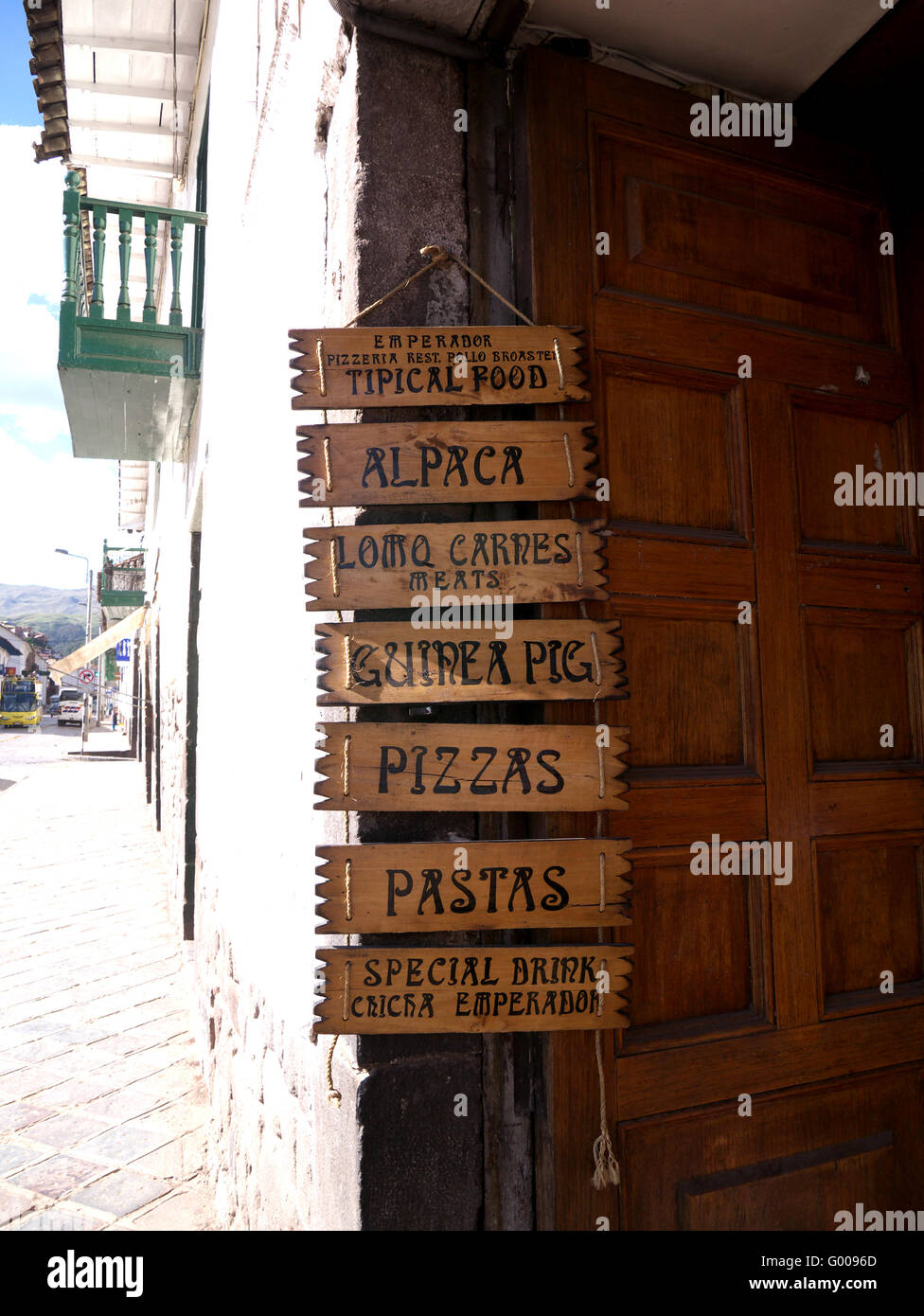 Menu outside restaurant showing guinea pig and alpaca on the menu in ...