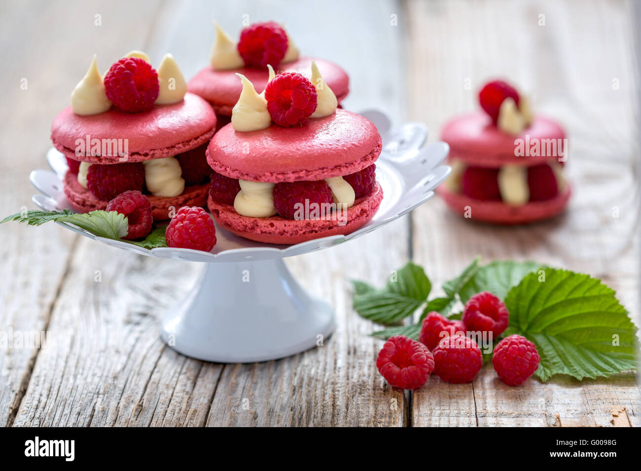 Cake with white chocolate and raspberries Stock Photo - Alamy