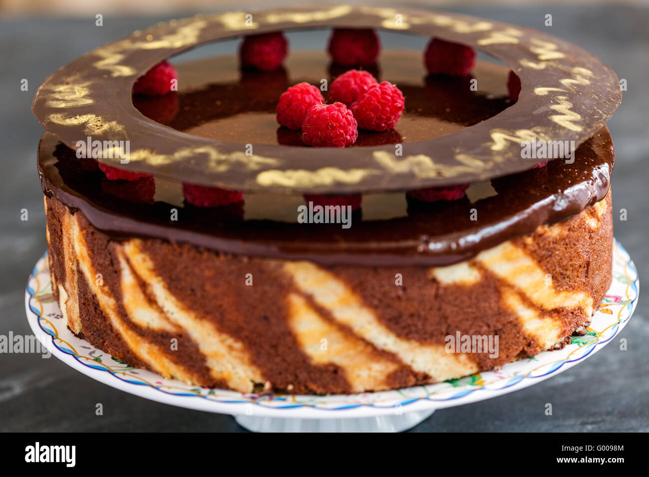Chocolate cake with raspberries Stock Photo - Alamy