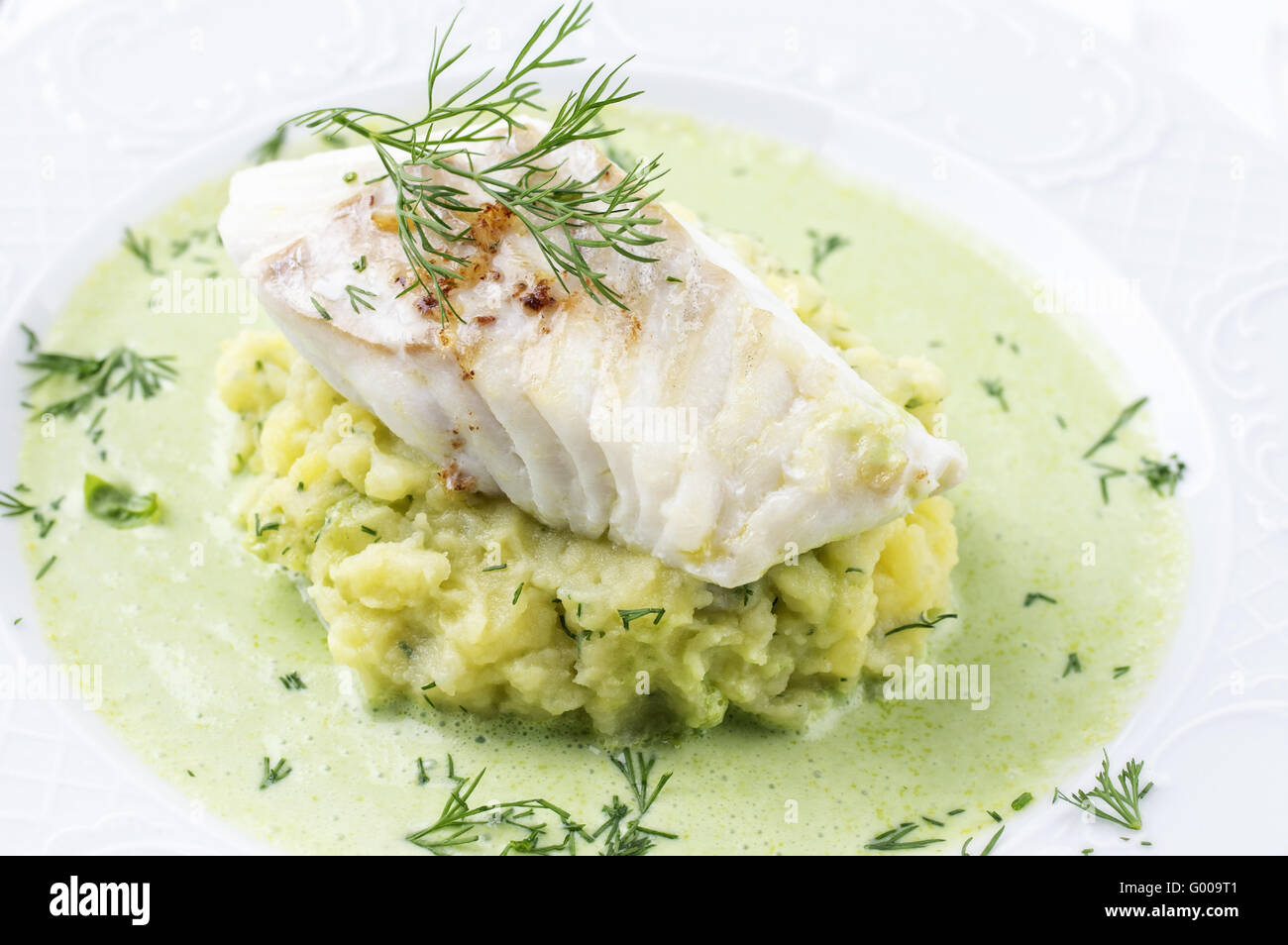 Cod filet in Basil Champagne Foam Stock Photo - Alamy