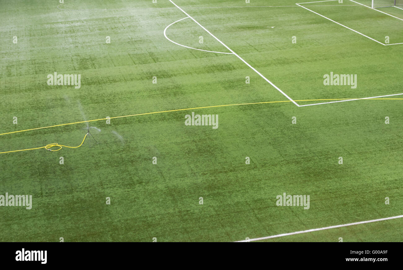 Wet soccer field hi-res stock photography and images - Alamy