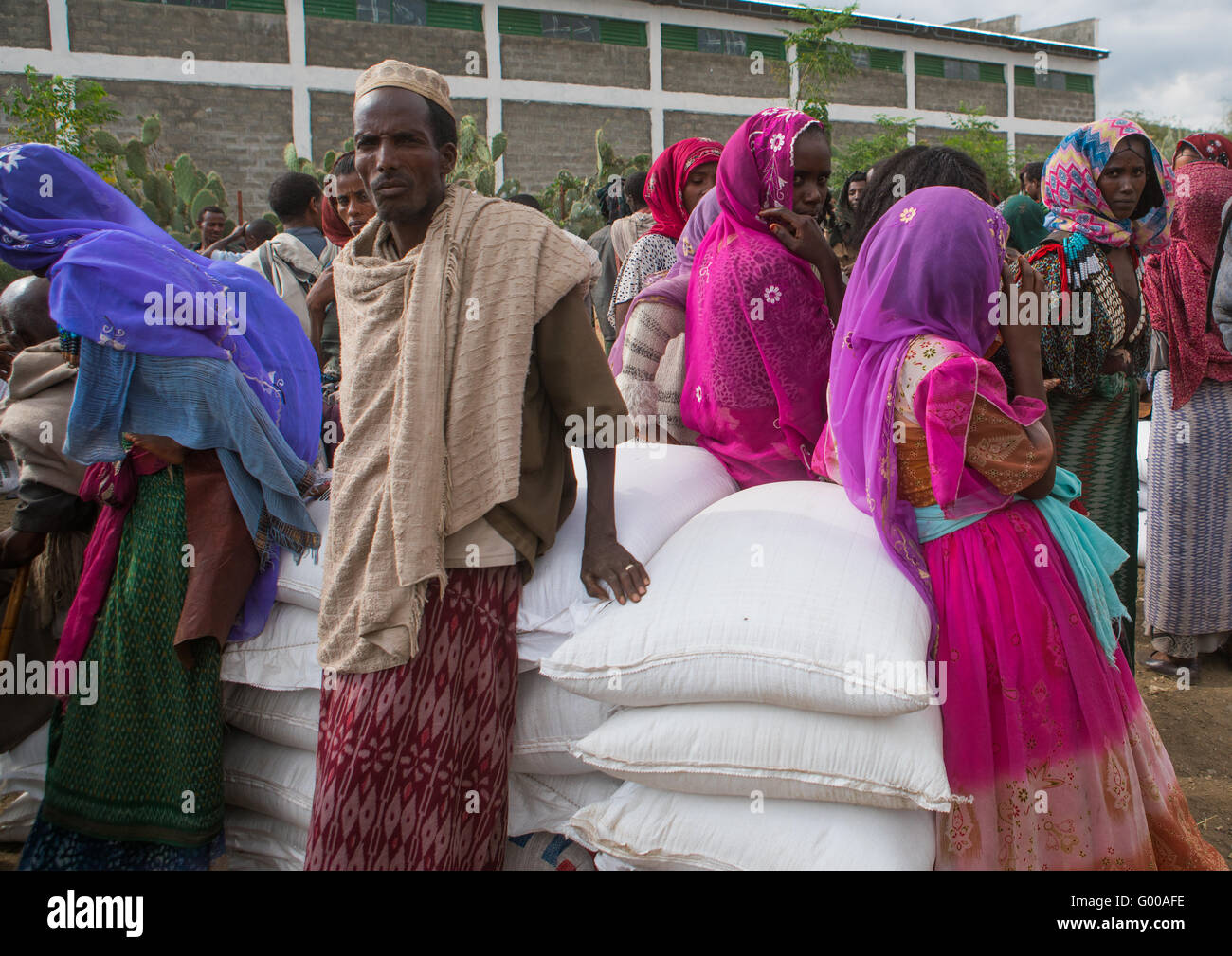 Ethiopia, Semien Wollo Zone, Woldia, ethiopian people wait at a food ...