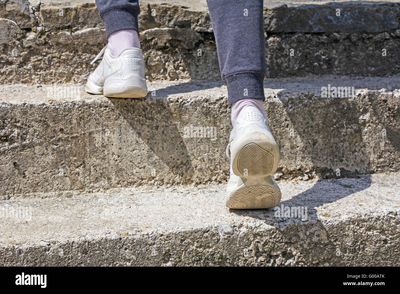 Girl walking up stairs outside hi-res stock photography and images - Alamy