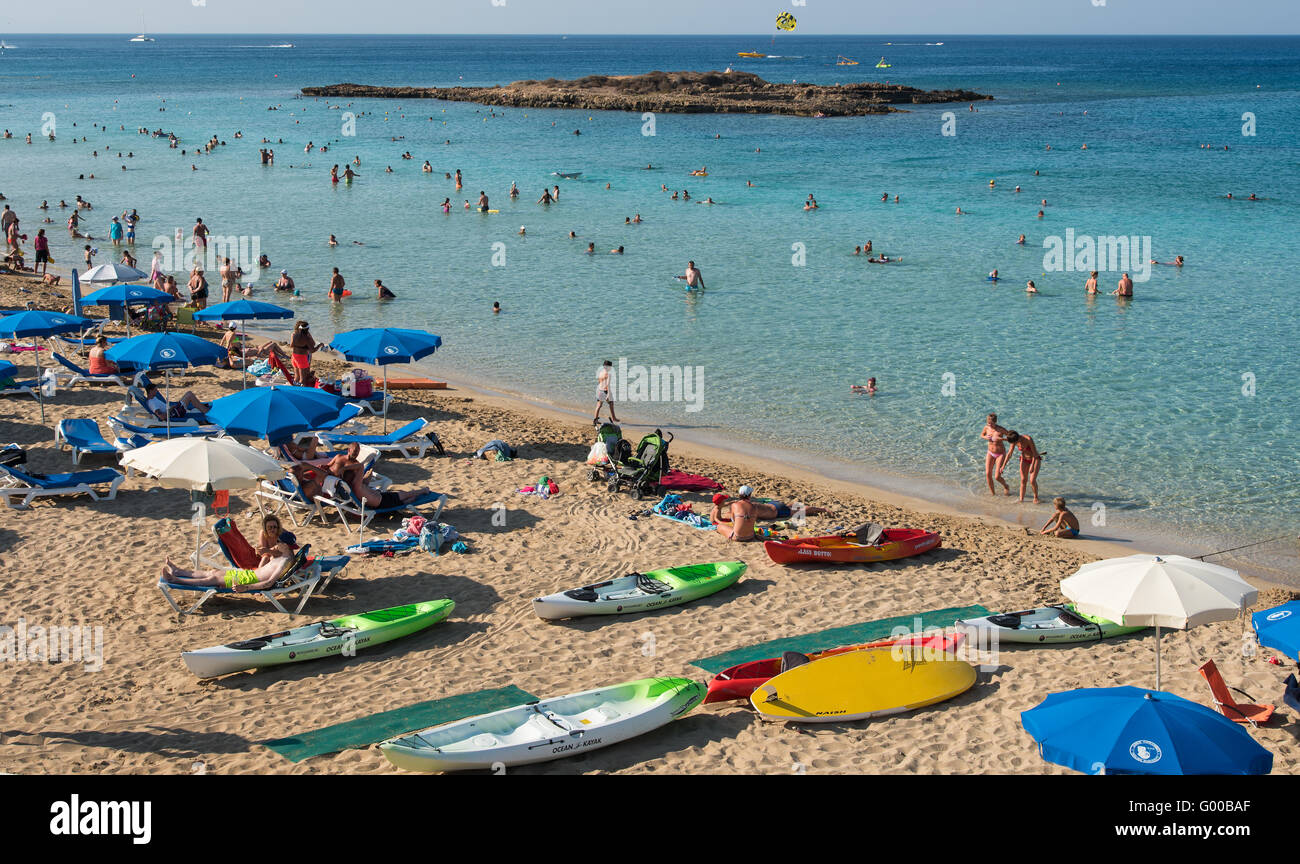 Tourists at Fig Tree famous bay beach at Protaras area in Cyprus ...