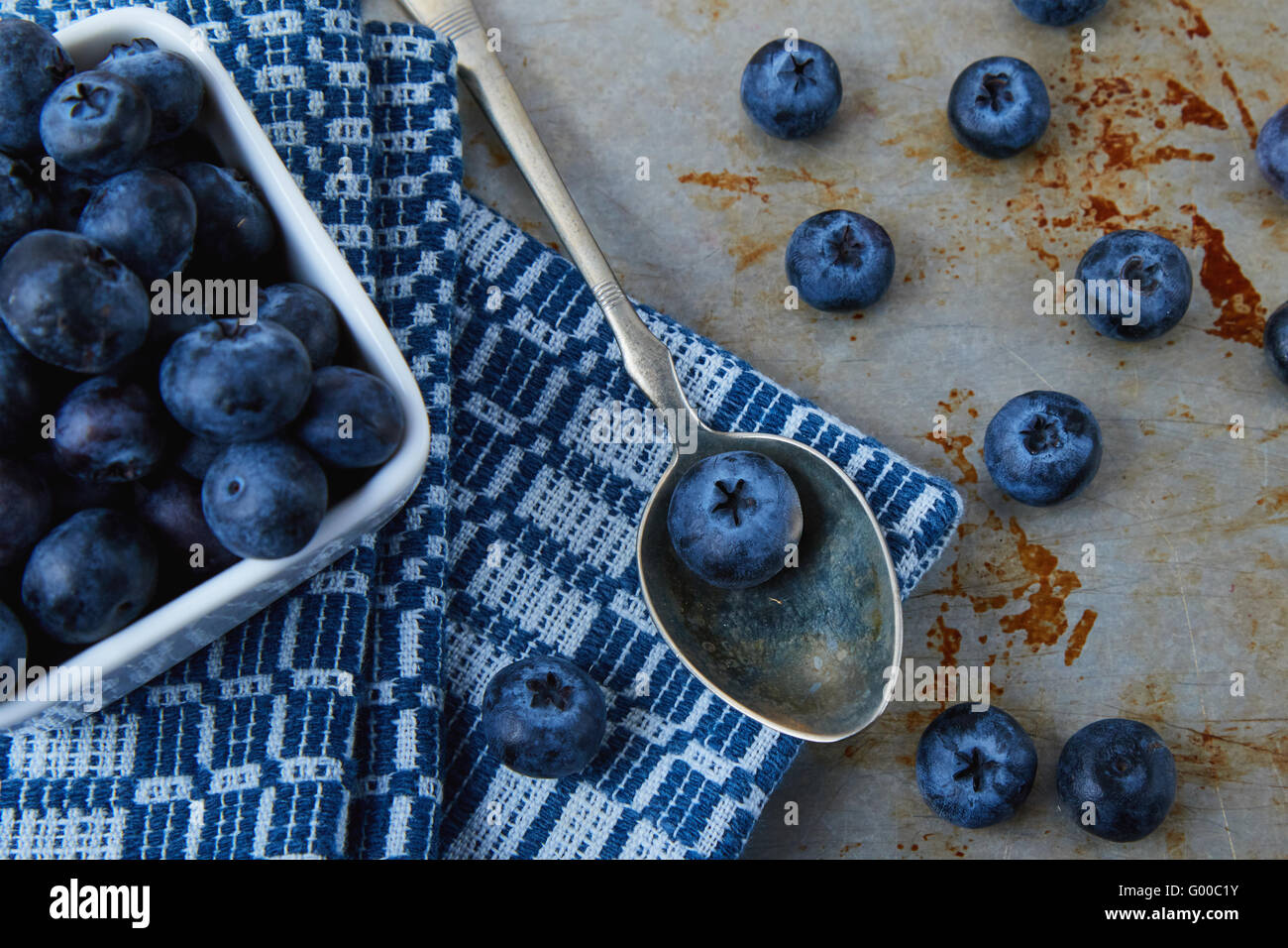 blueberries on steel table Stock Photo - Alamy