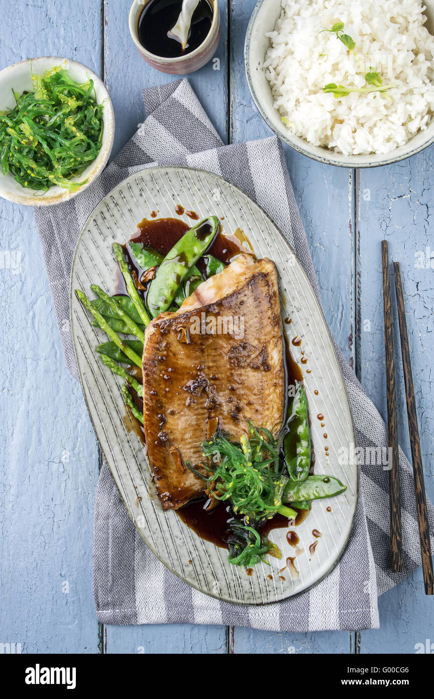 Coalfish with Rice and Vegetable Stock Photo - Alamy