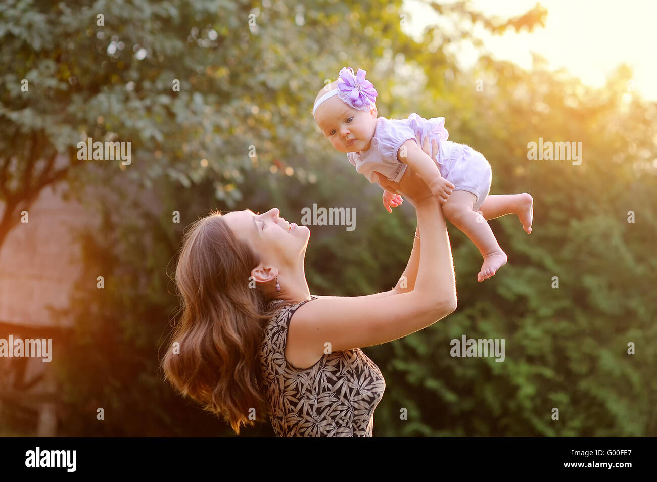 sunshine spring summer day playing child Stock Photo - Alamy