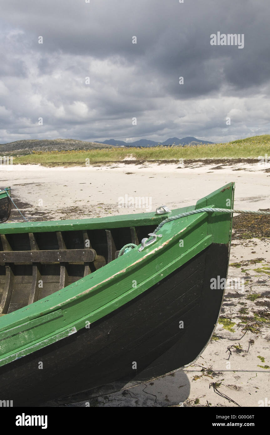Boat on a sandy beach Stock Photo - Alamy