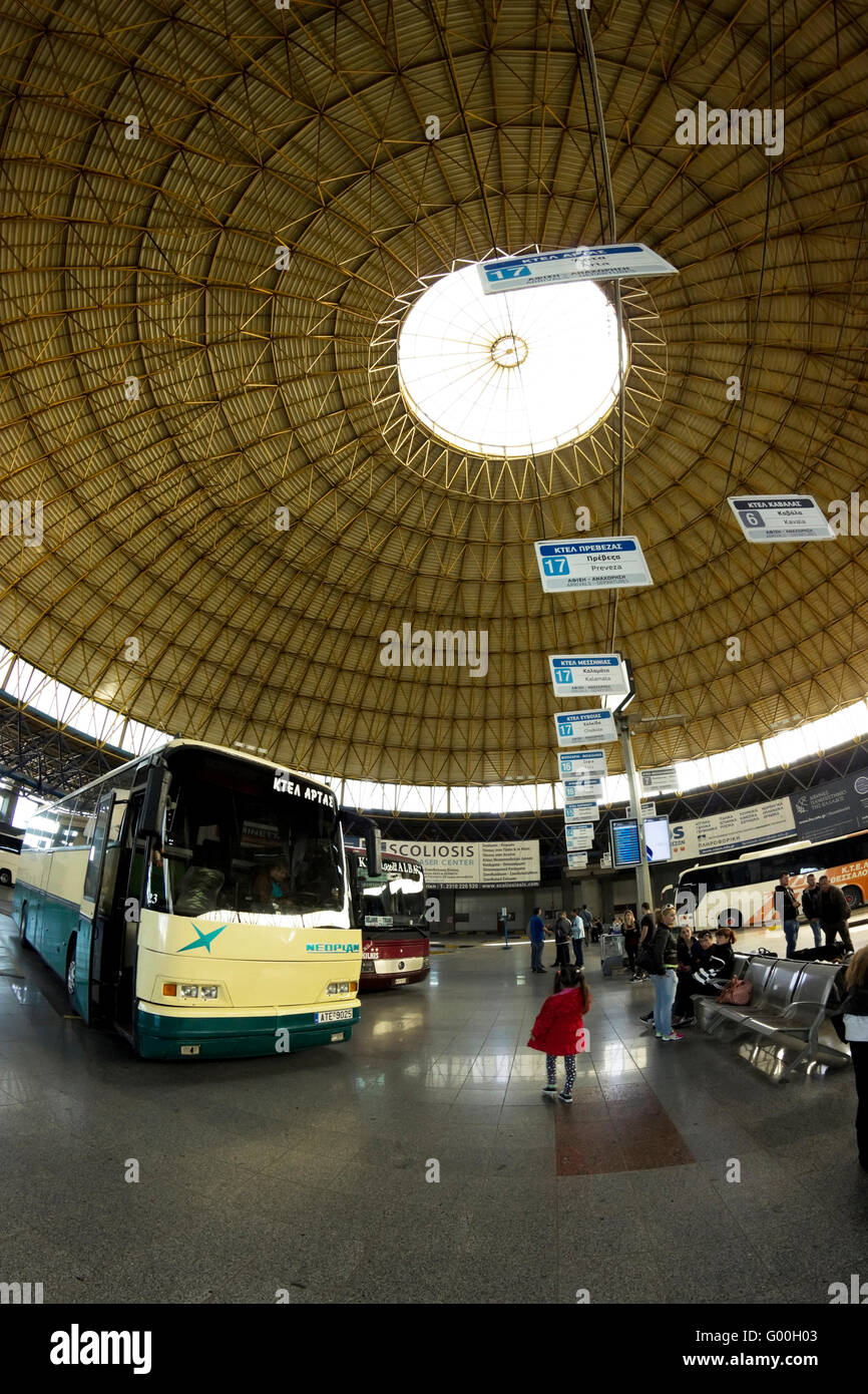 Departure/arrivals waiting area and numbered destination stand signs ...