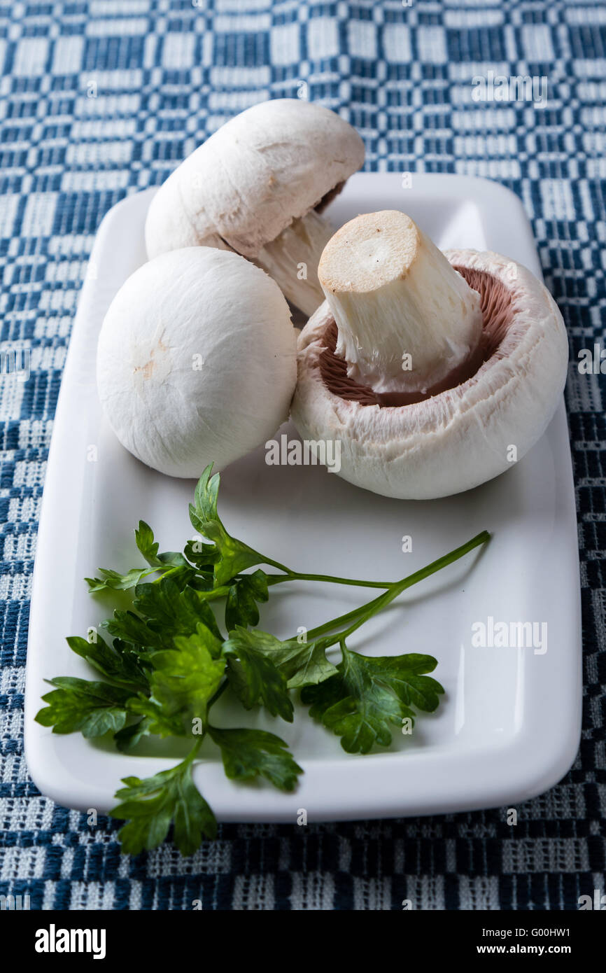 champignon mushrooms with parsley Stock Photo - Alamy