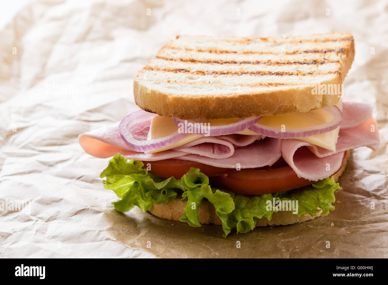 toast ham sandwich on brown paper Stock Photo - Alamy