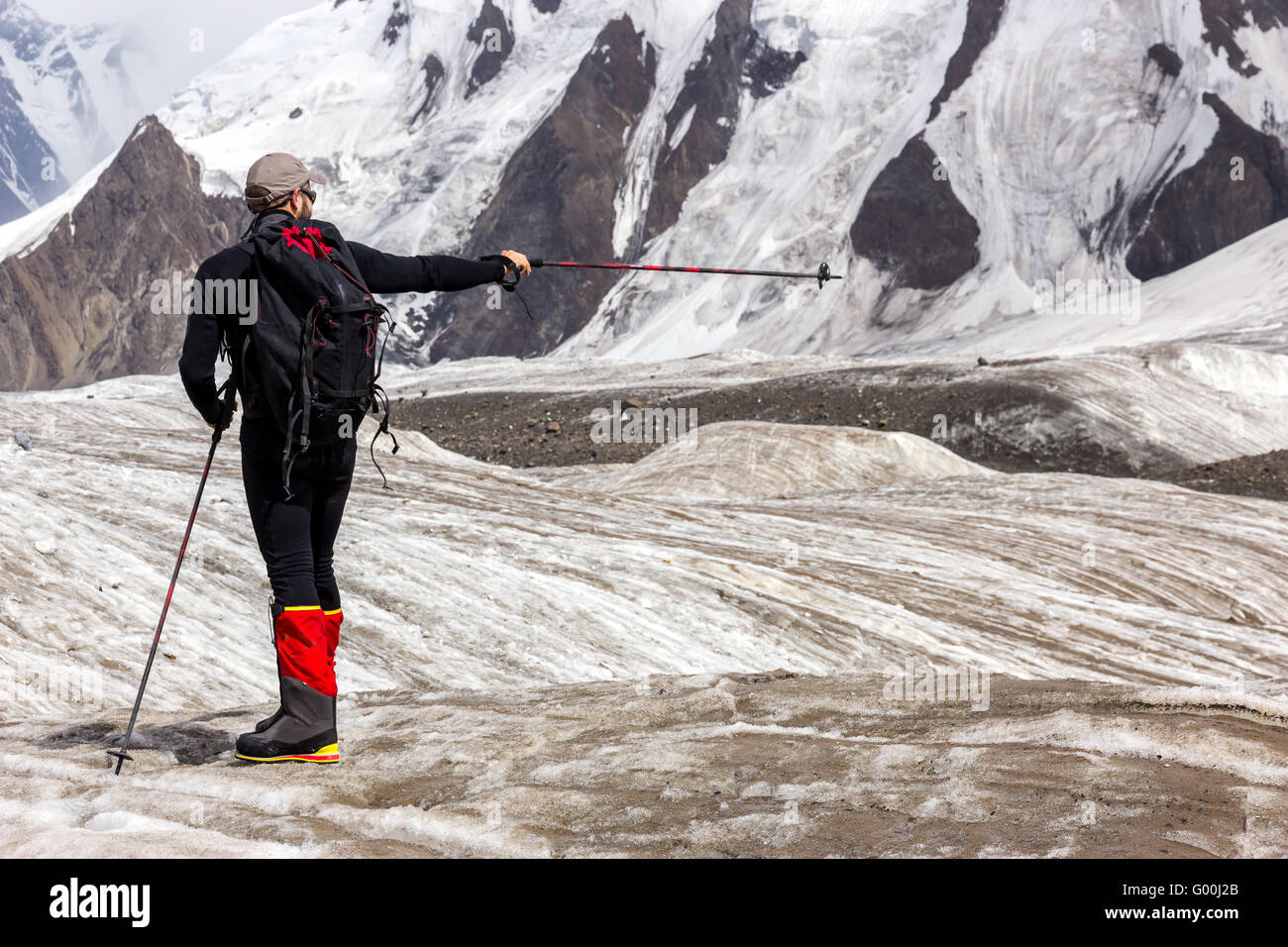 Mountain Climber Pointing Direction Stock Photo - Alamy