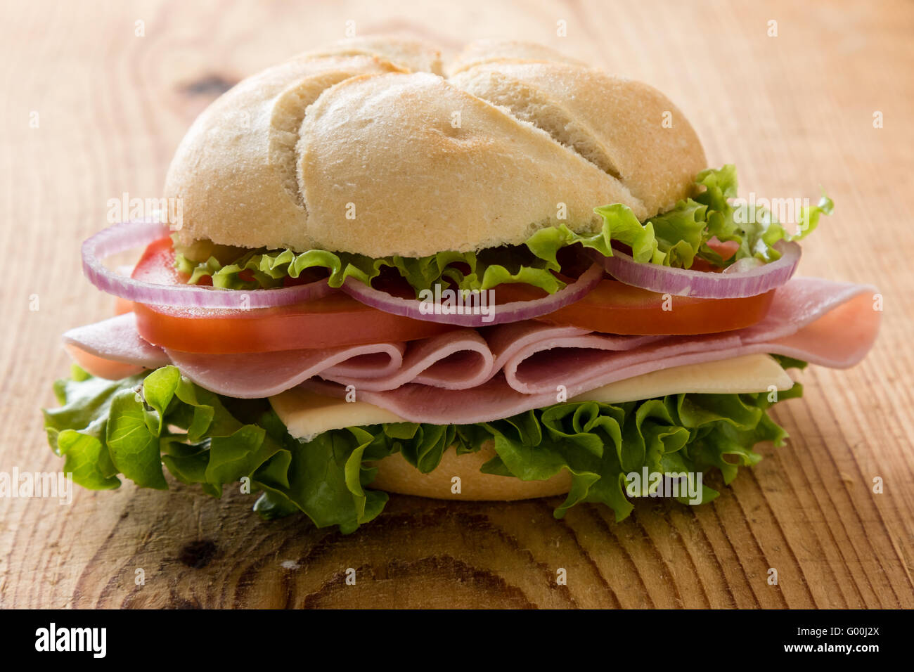 ham sandwich on wooden table Stock Photo - Alamy