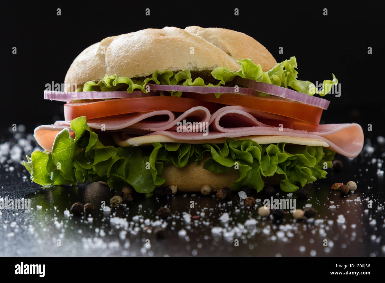 ham sandwich on black table Stock Photo - Alamy