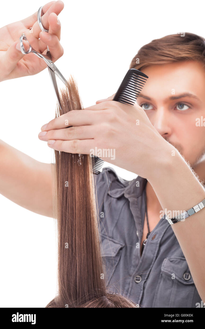 Professional hairdresser with long hair model Stock Photo - Alamy