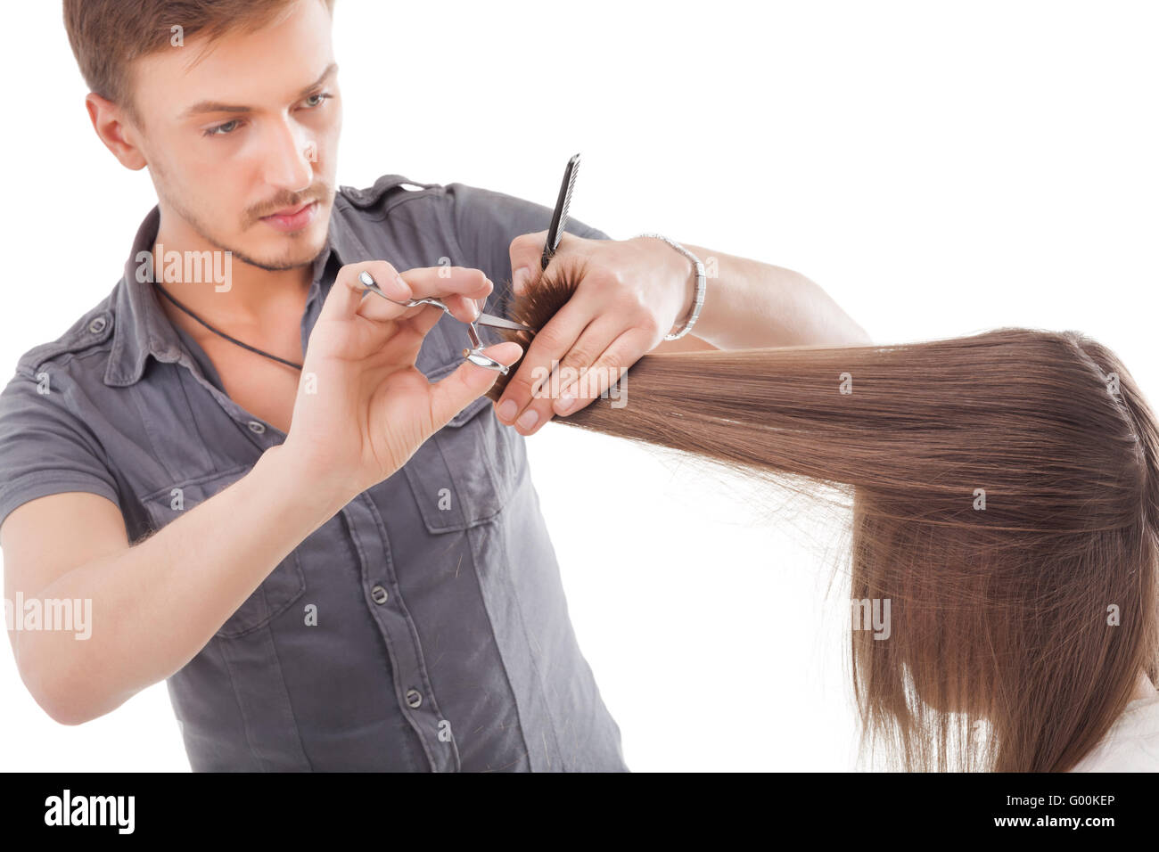 Professional hairdresser with long hair model Stock Photo - Alamy