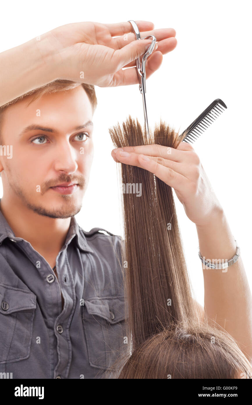 Professional hairdresser with long hair model Stock Photo - Alamy