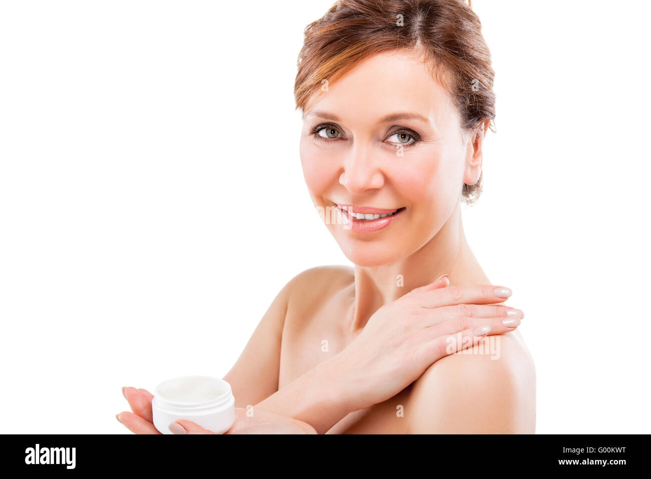 Pretty woman applying face cream hi-res stock photography and images ...
