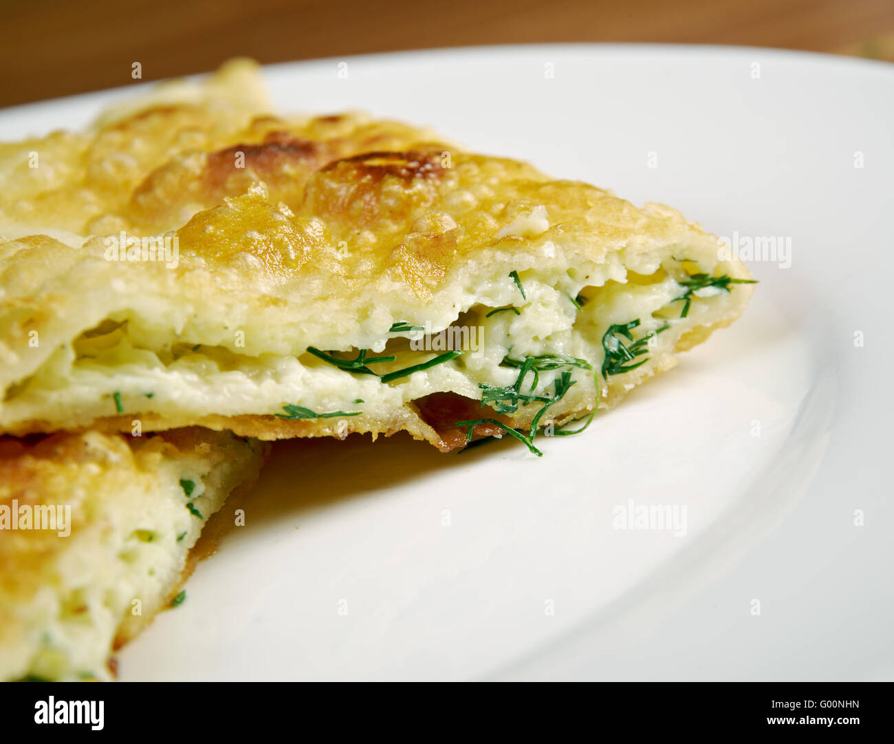 Cheburek with cheese Stock Photo - Alamy