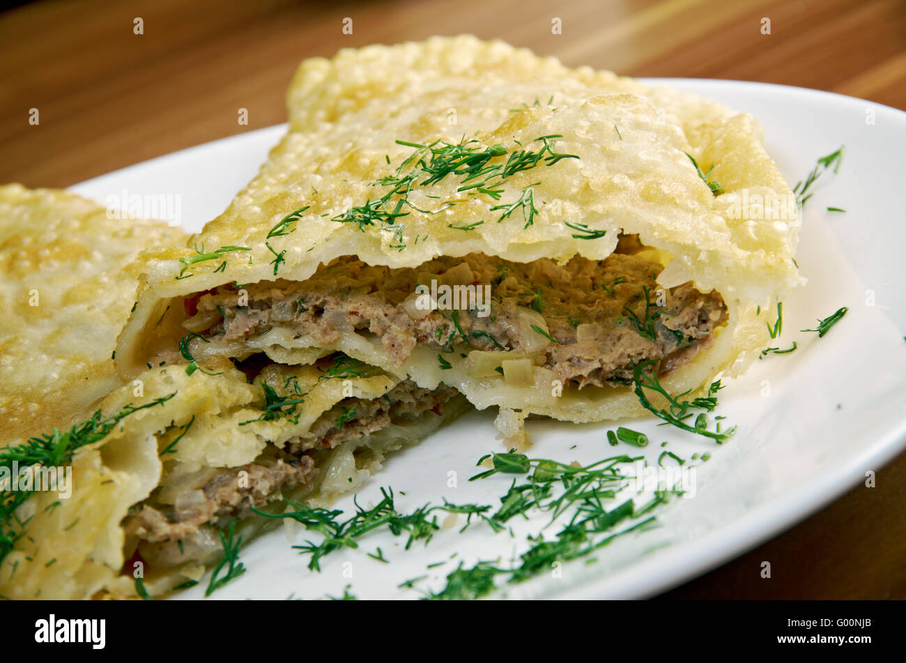 Cheburek with meat Stock Photo - Alamy
