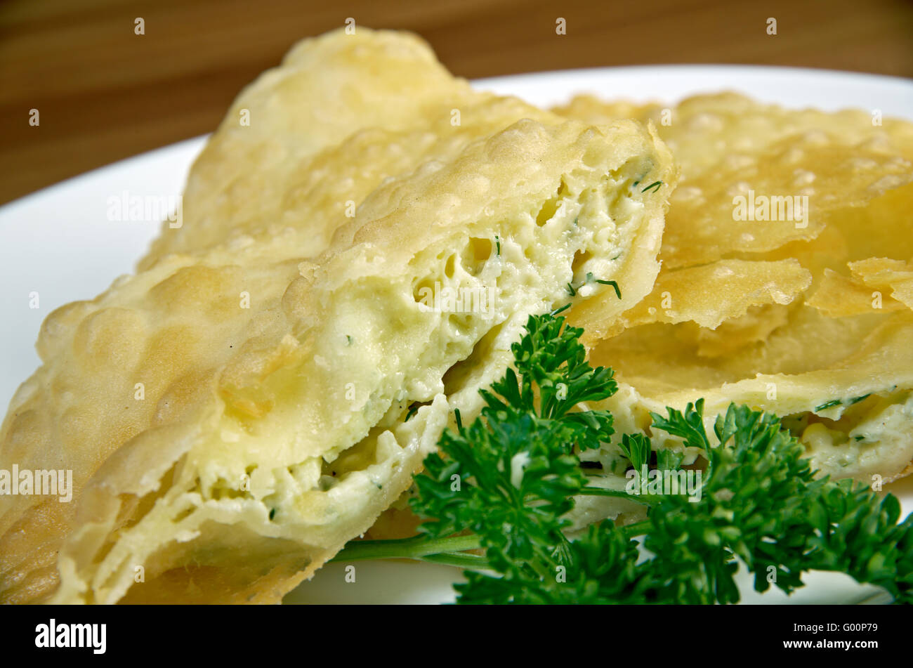 Cheburek with cheese Stock Photo - Alamy