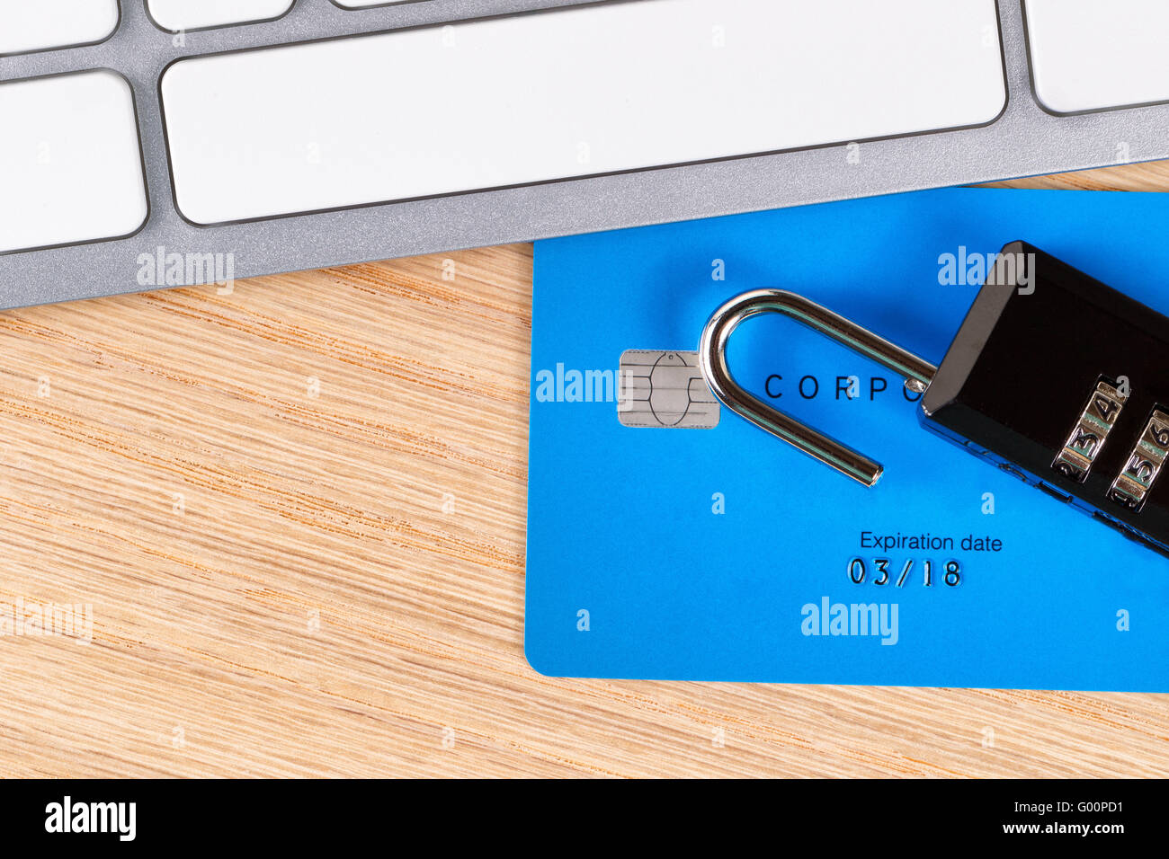 Credit cards with open lock on desktop Stock Photo - Alamy