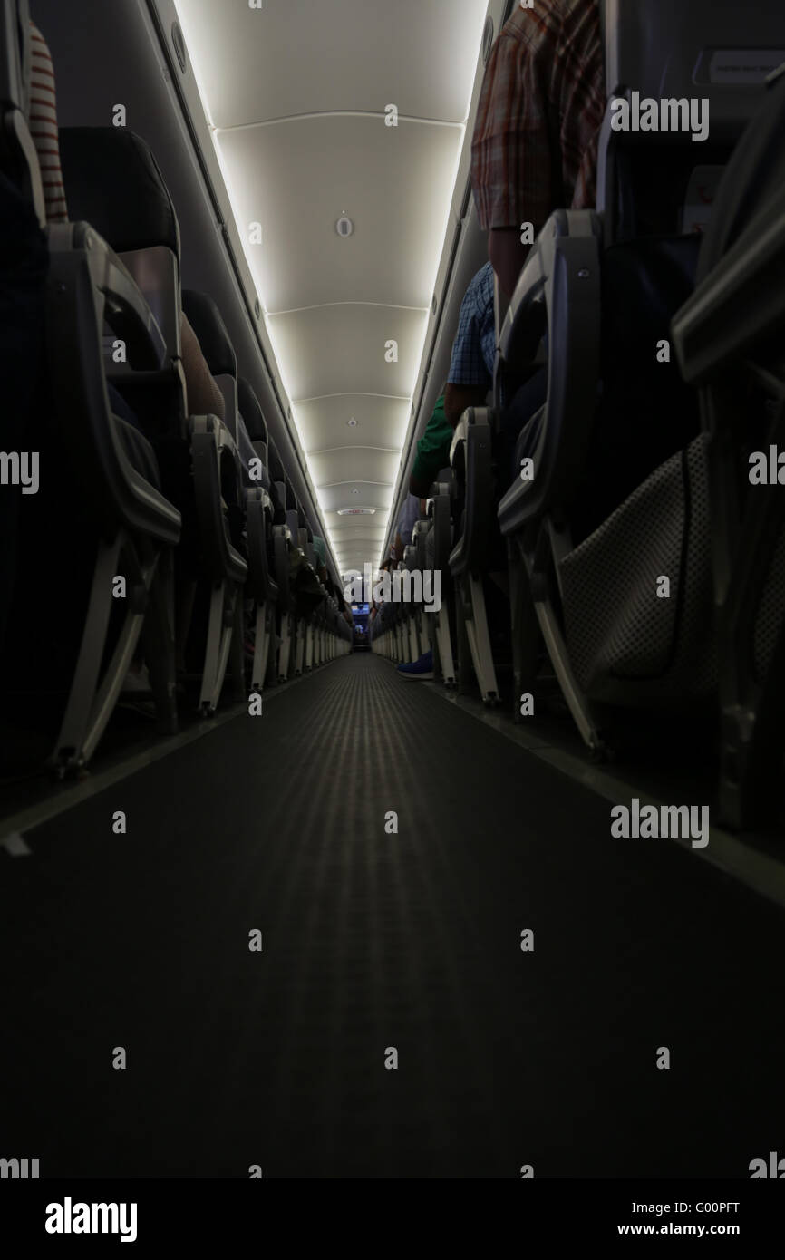 Plane Aisle Passenger Stock Photos & Plane Aisle Passenger Stock Images ...