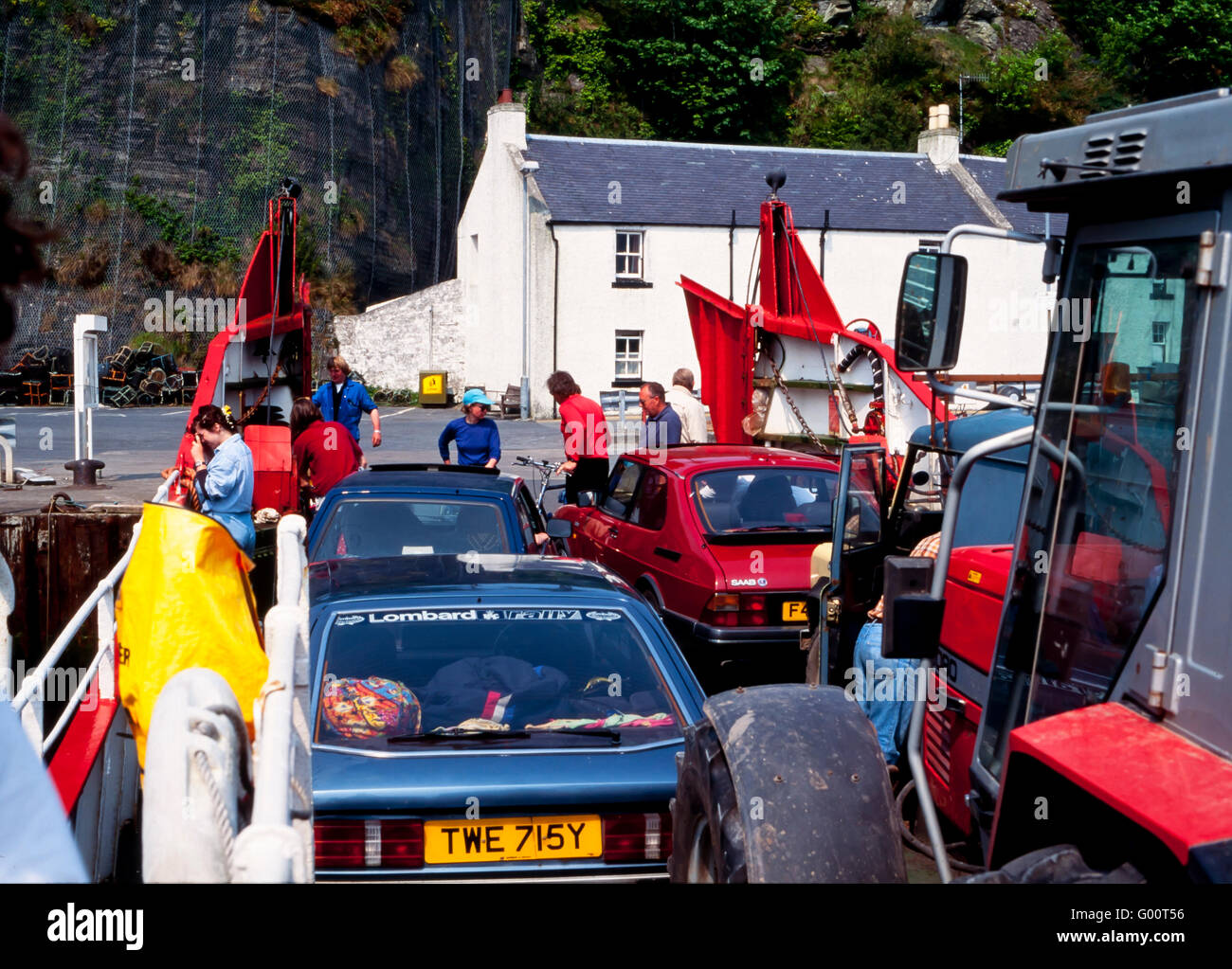 Vehicles and passengers arriving back to Port Askaig from Jura aboard ...