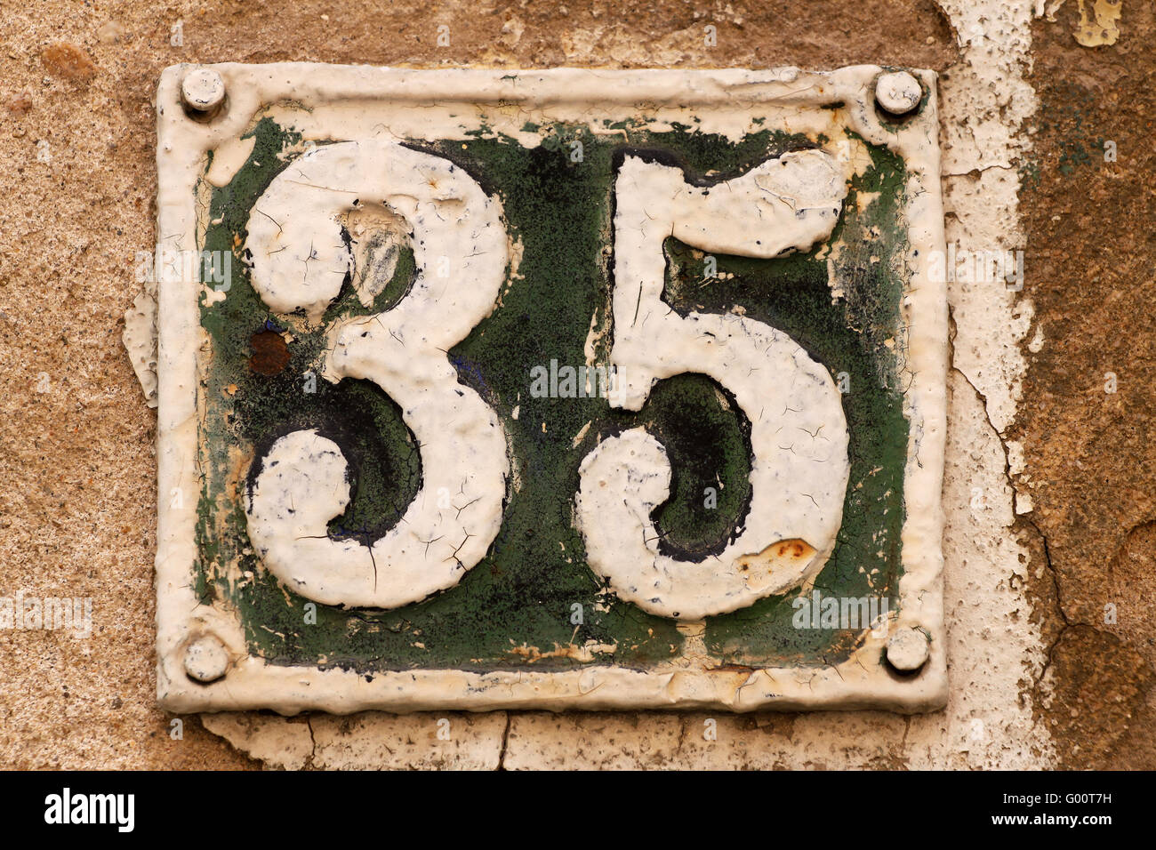 House number on a wall Stock Photo - Alamy