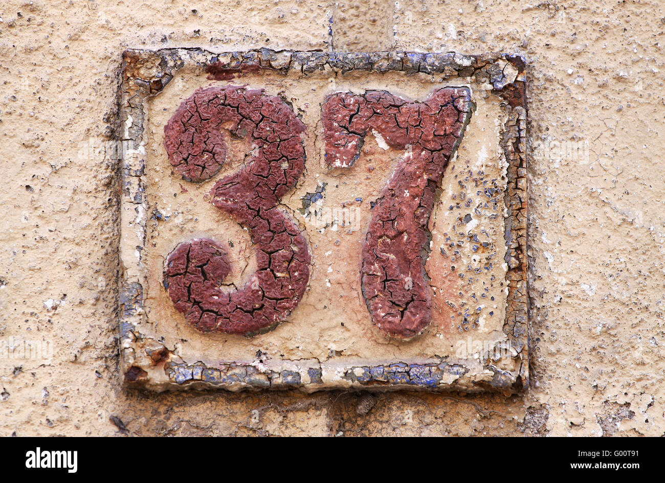 House number on a wall Stock Photo - Alamy