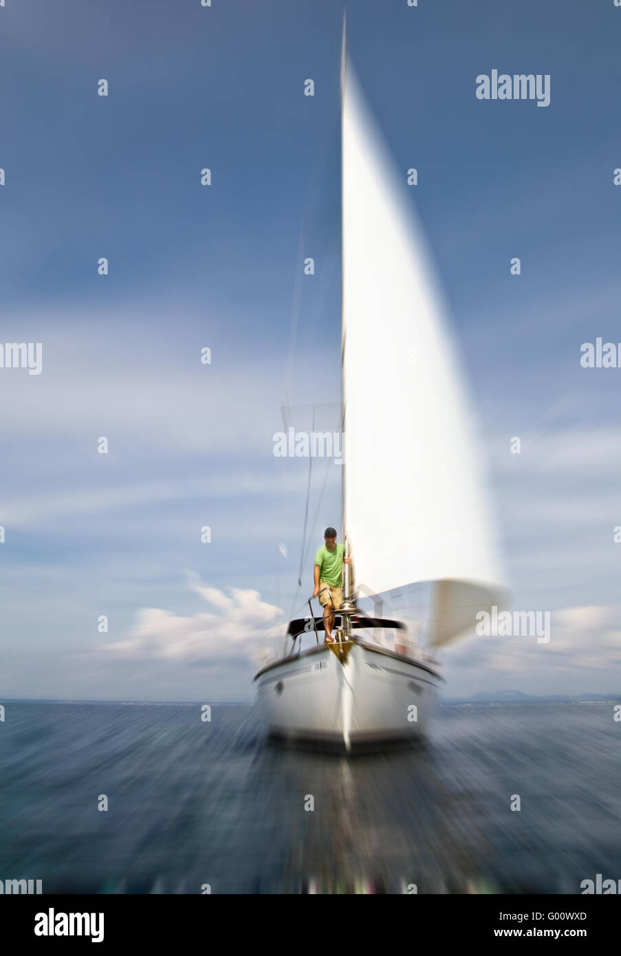 Sailing yacht with a direct path to the viewer Stock Photo - Alamy