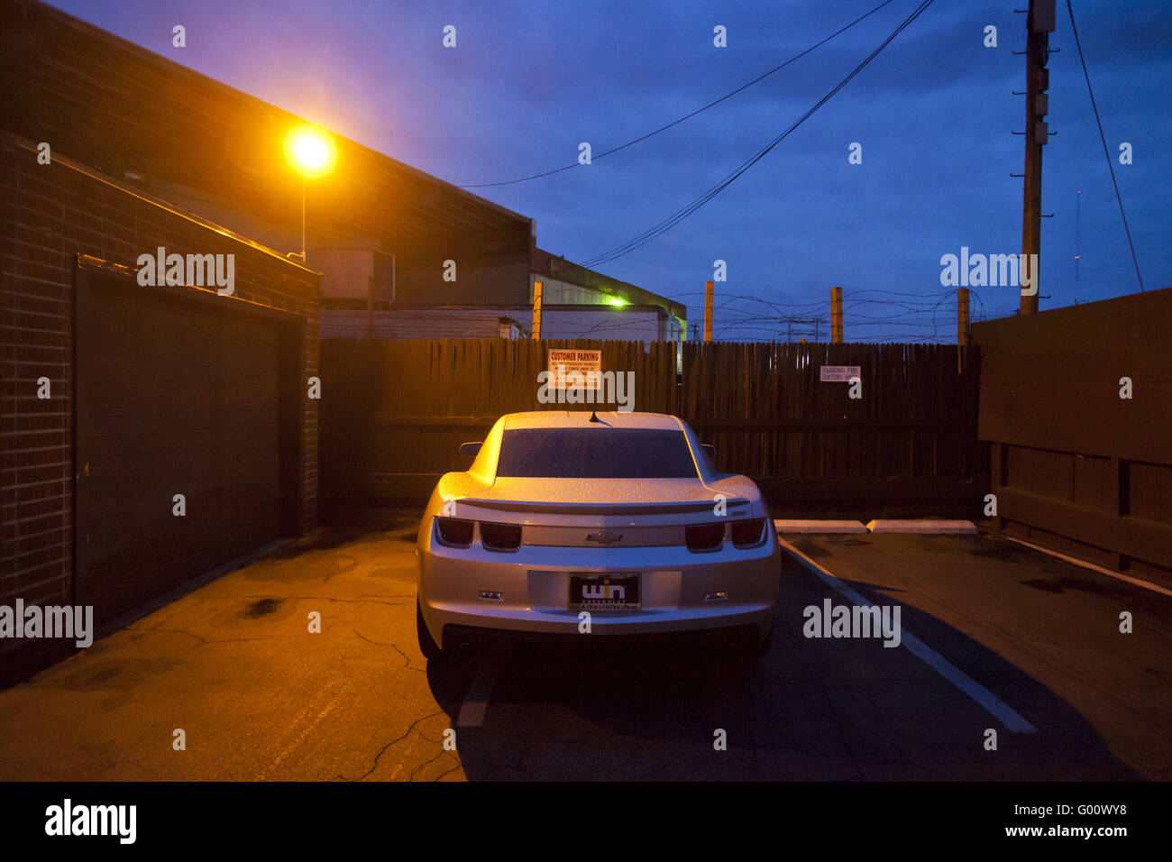 Car parked at twilight Stock Photo - Alamy