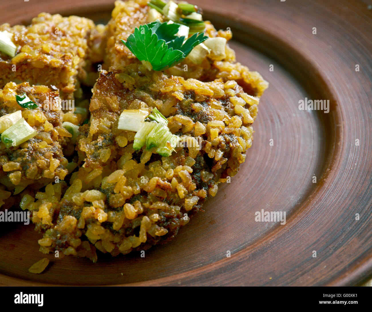 kibbeh - Levantine dish made of bulgur, minced onions, and finely ...