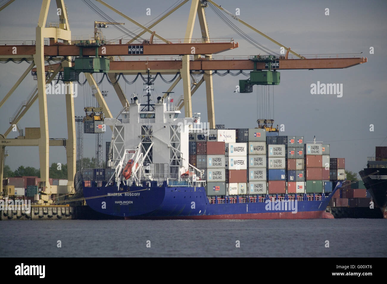 container vessel in the harbour of Riga Stock Photo - Alamy