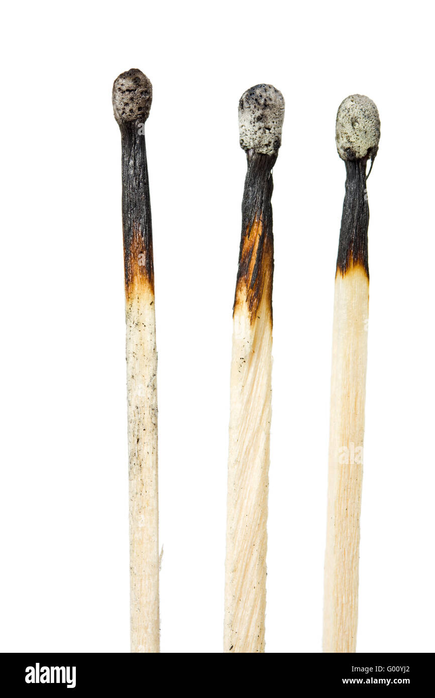 three burned matches isolated on white background Stock Photo - Alamy