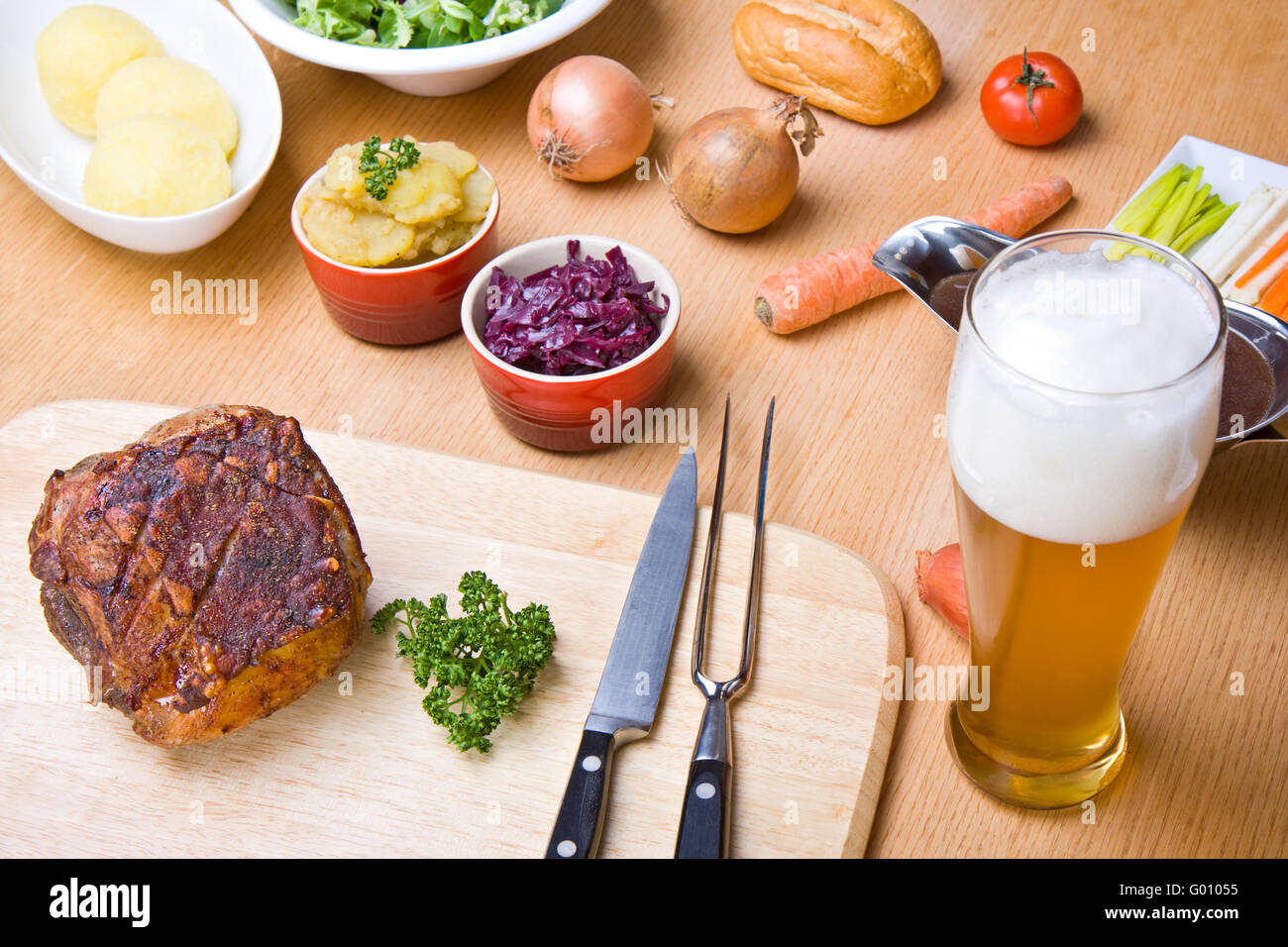 traditional bavarian roast pork with beer sauce and dumplings Stock ...