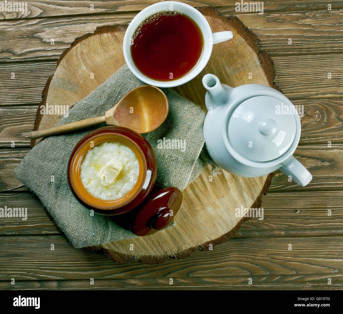 The traditional Russian breakfast - millet porridge with butter and ...