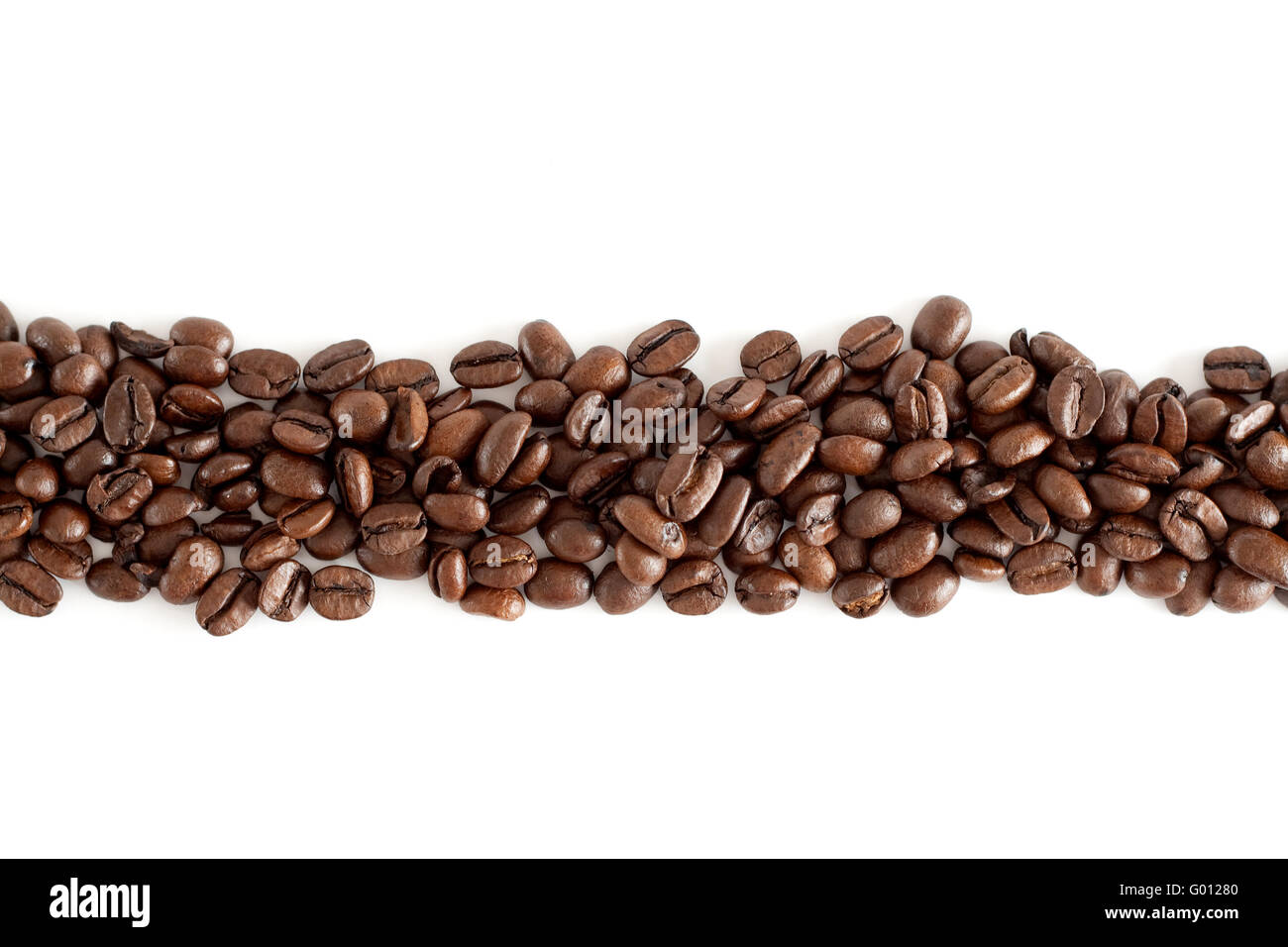 A line of isolated coffee beans with white background Stock Photo - Alamy