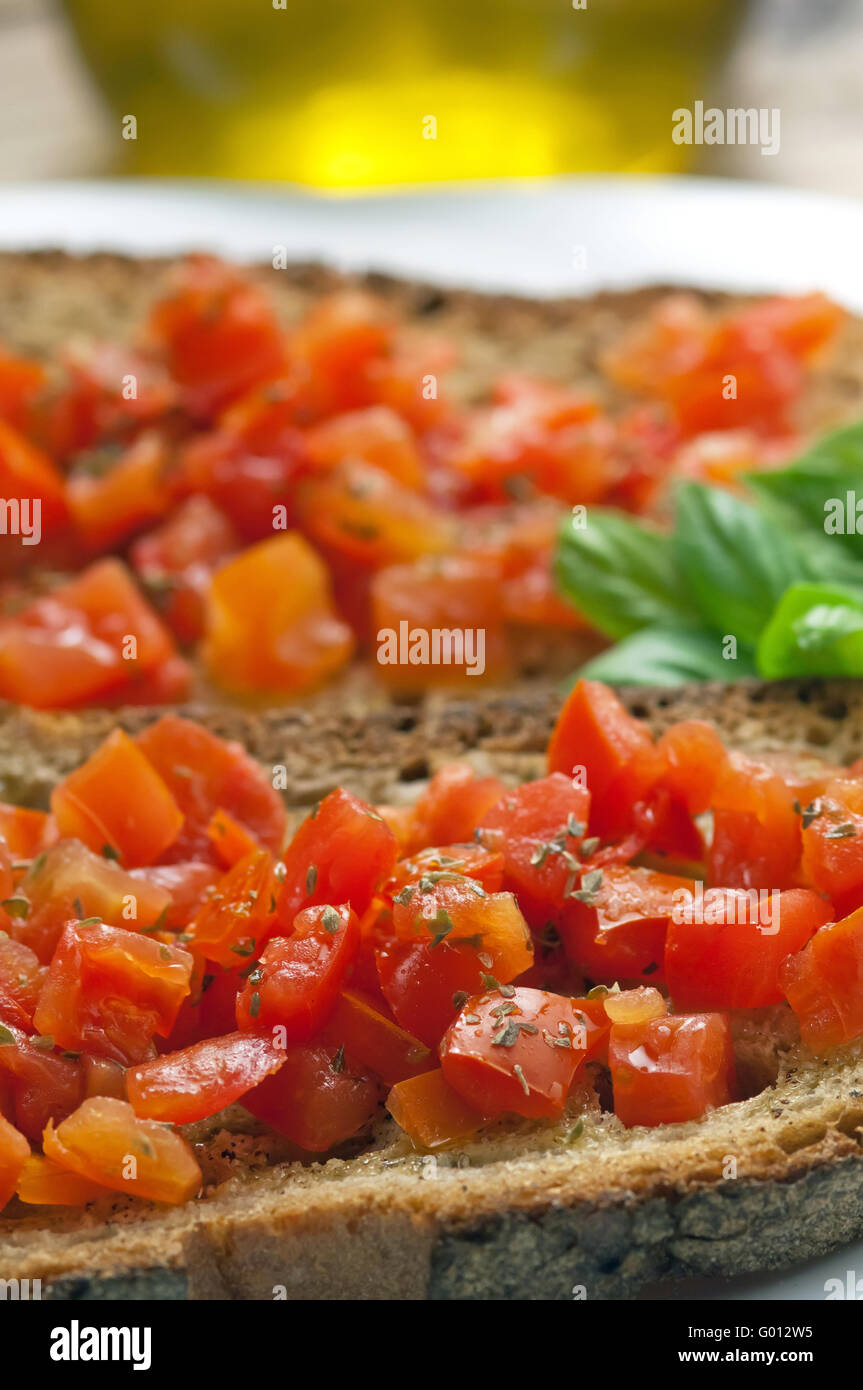 Italian bruschetta bread with chopped organic tomatoes Stock Photo - Alamy