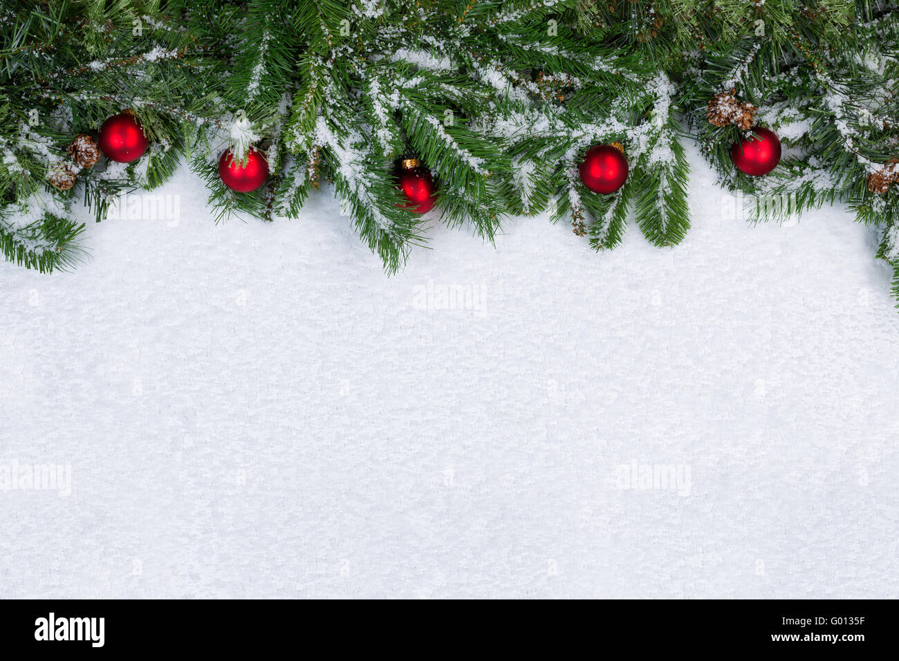 Christmas objects covered with fresh snow Stock Photo - Alamy
