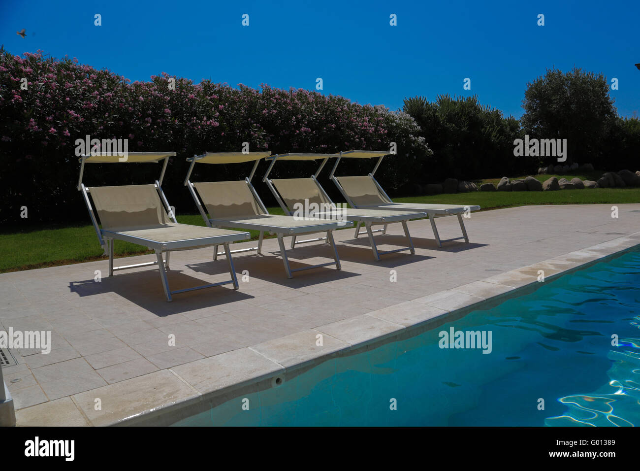 Swimming pool seats Stock Photo - Alamy