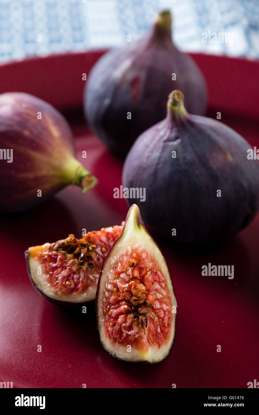 cut figs on a plate Stock Photo - Alamy