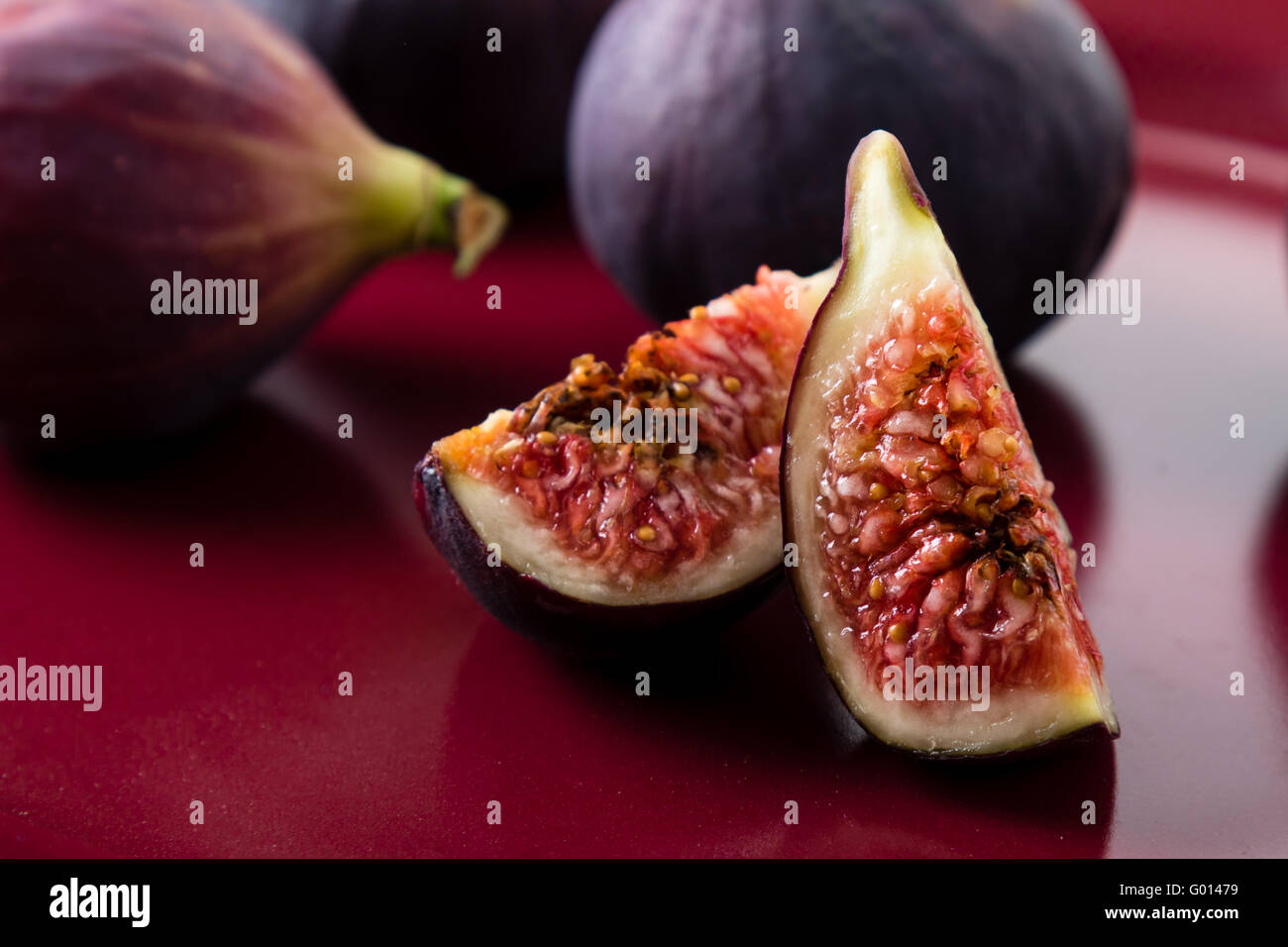 cut figs on a plate Stock Photo - Alamy