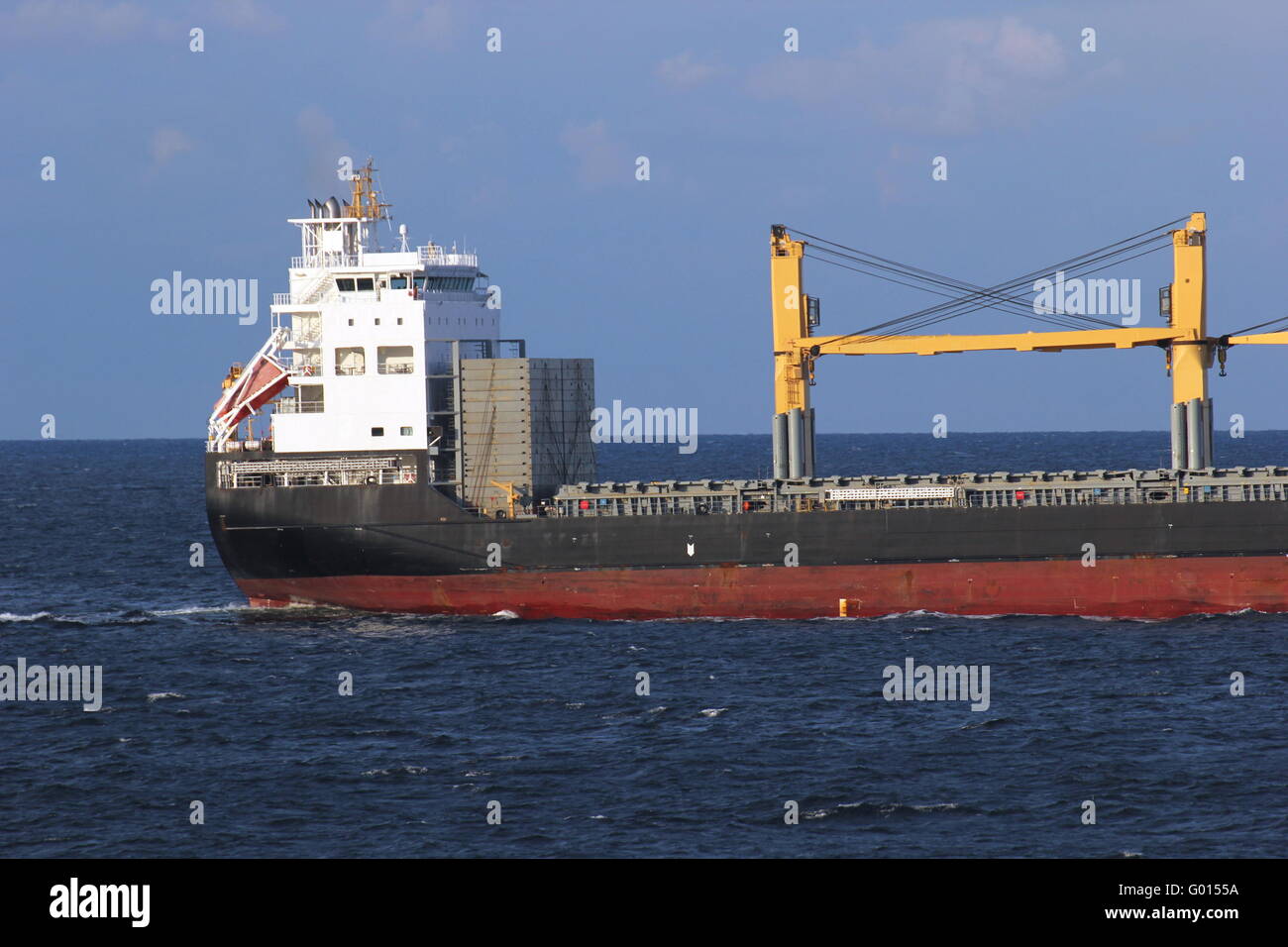 Freight ship in open waters Stock Photo - Alamy