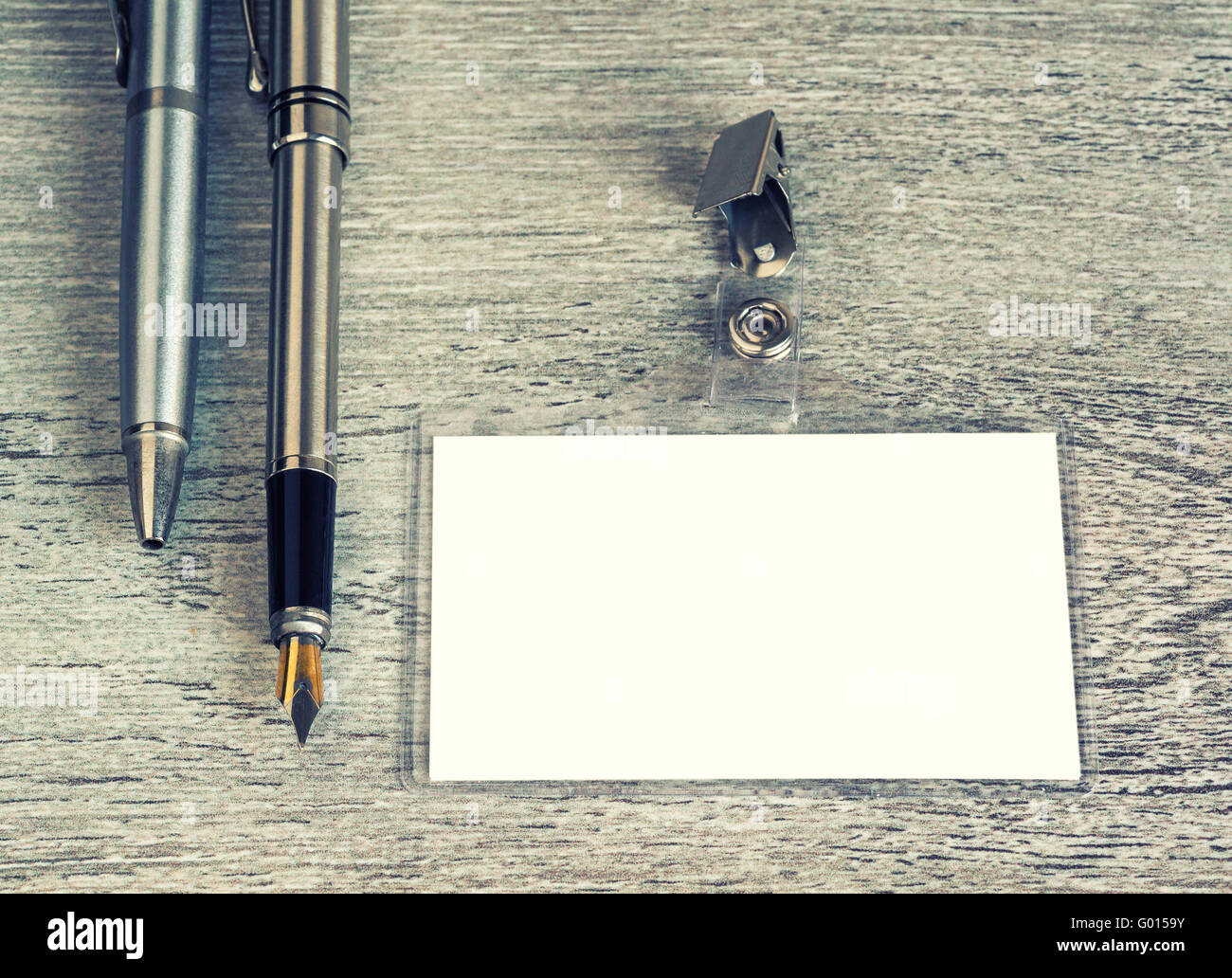 Behind badge hi-res stock photography and images - Alamy