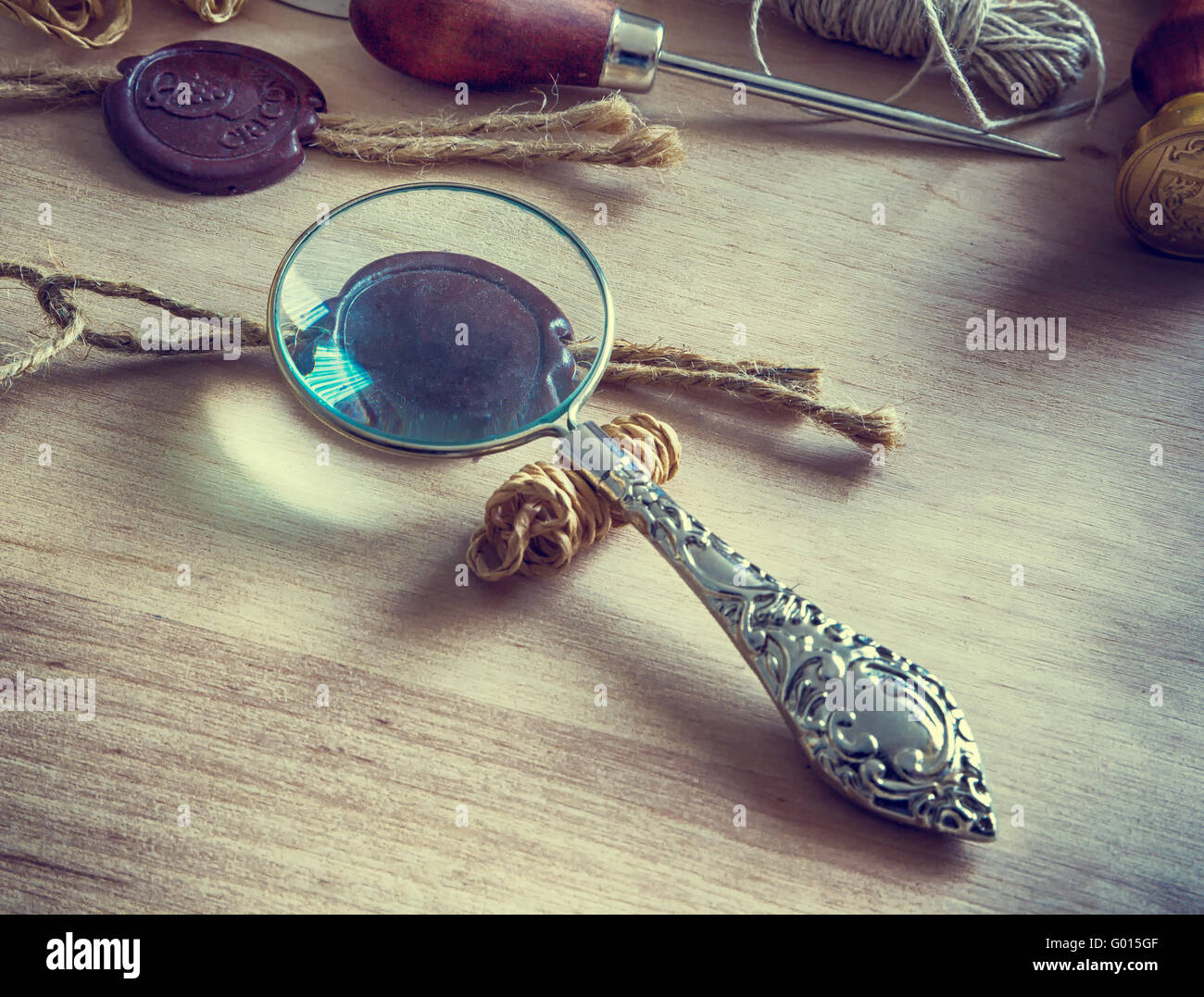 magnifying glass, retro style, mail Stock Photo - Alamy