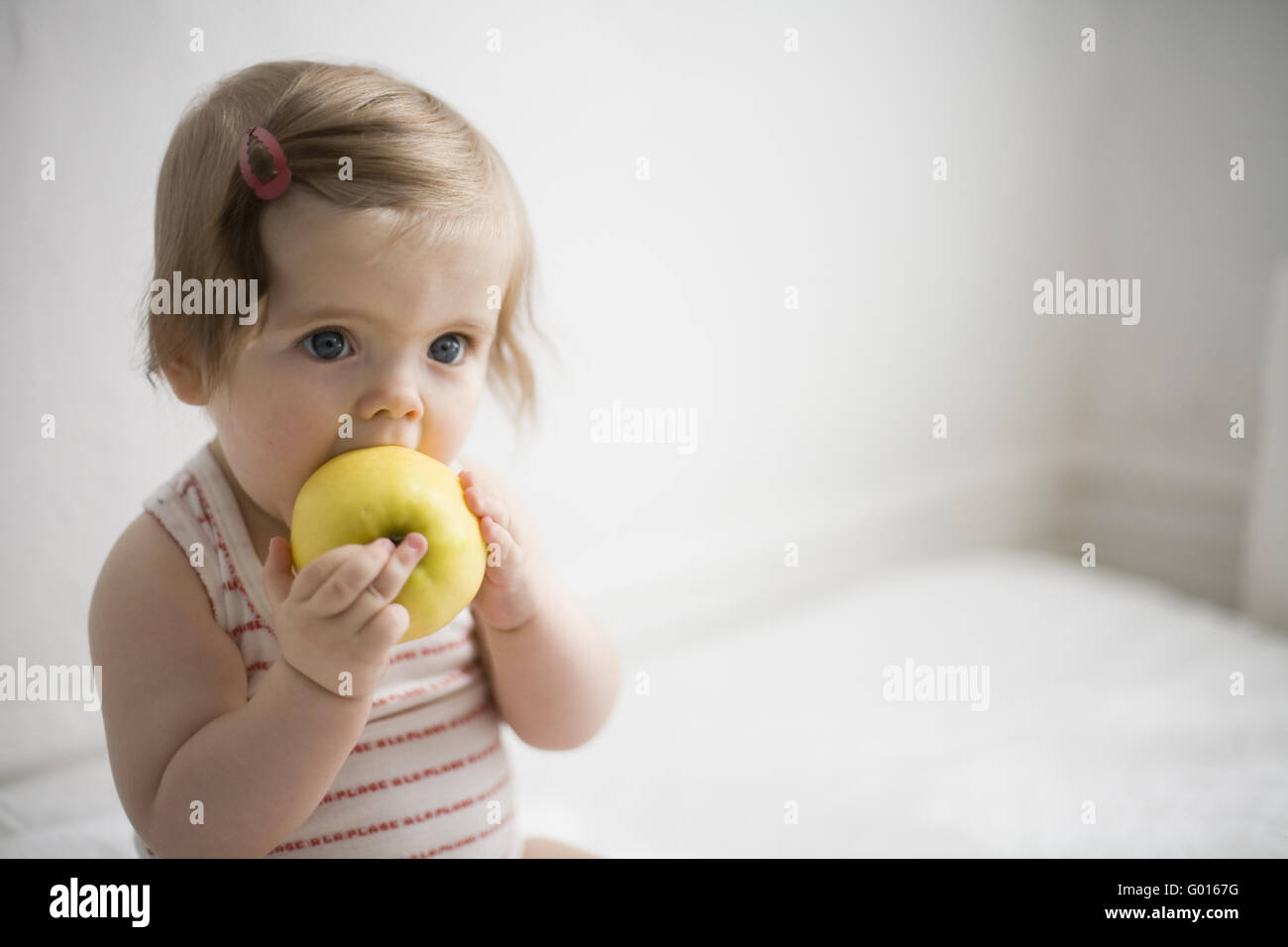 baby with apple Stock Photo - Alamy