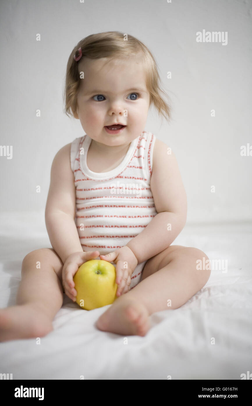 baby with apple Stock Photo - Alamy