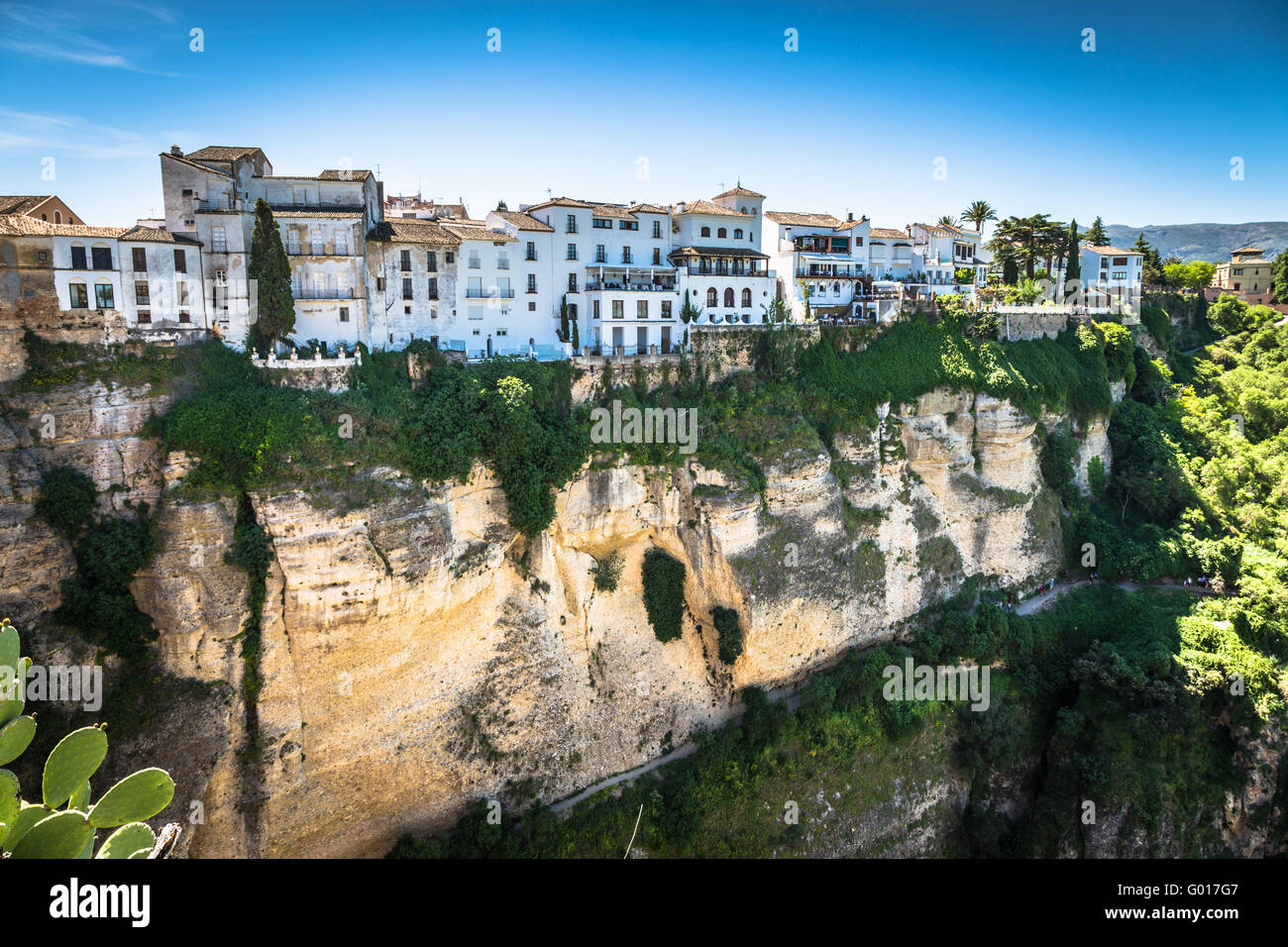 view of buildings over cliff in ronda, spain Stock Photo - Alamy