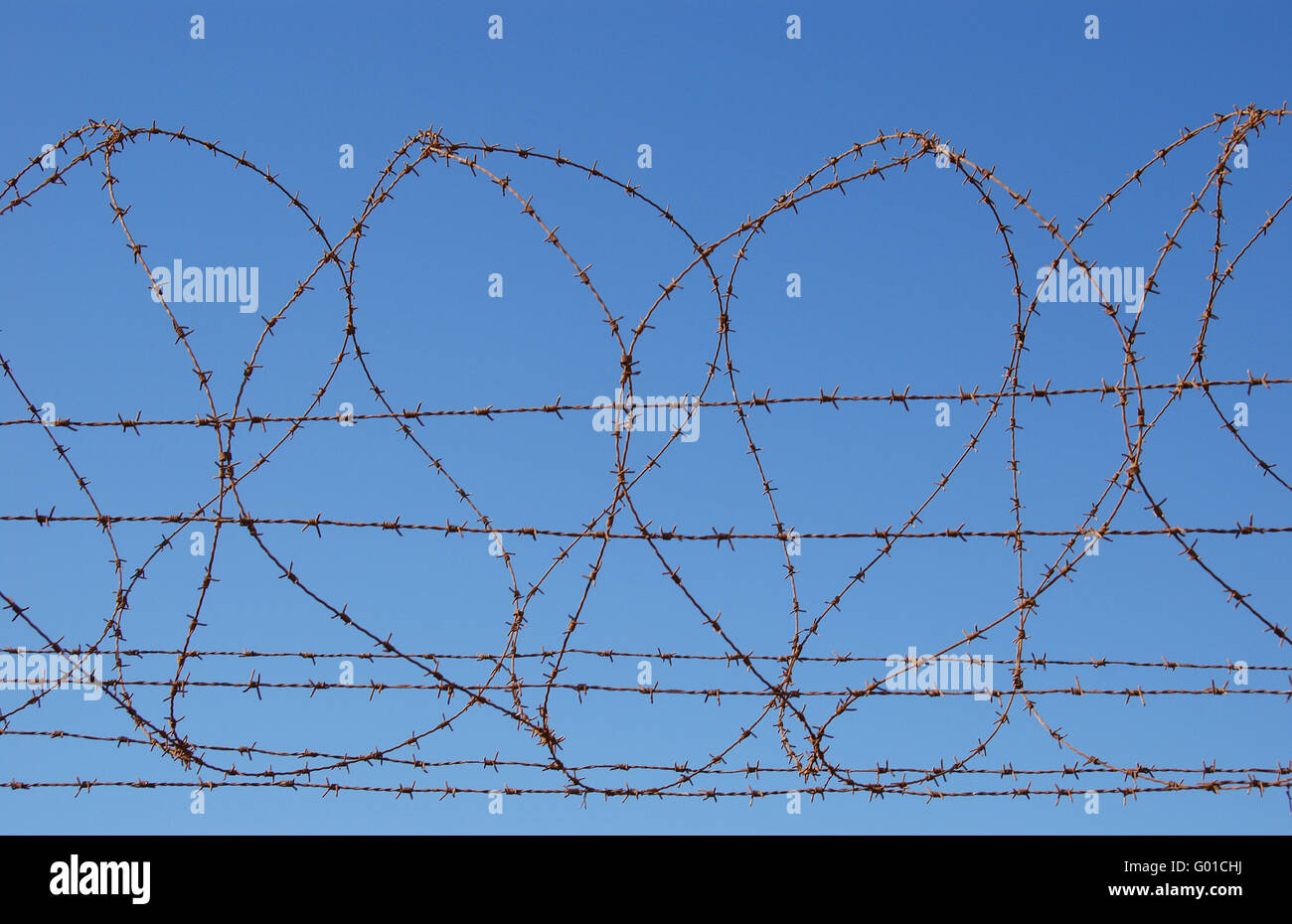 Danger barbed wire sign hi-res stock photography and images - Alamy